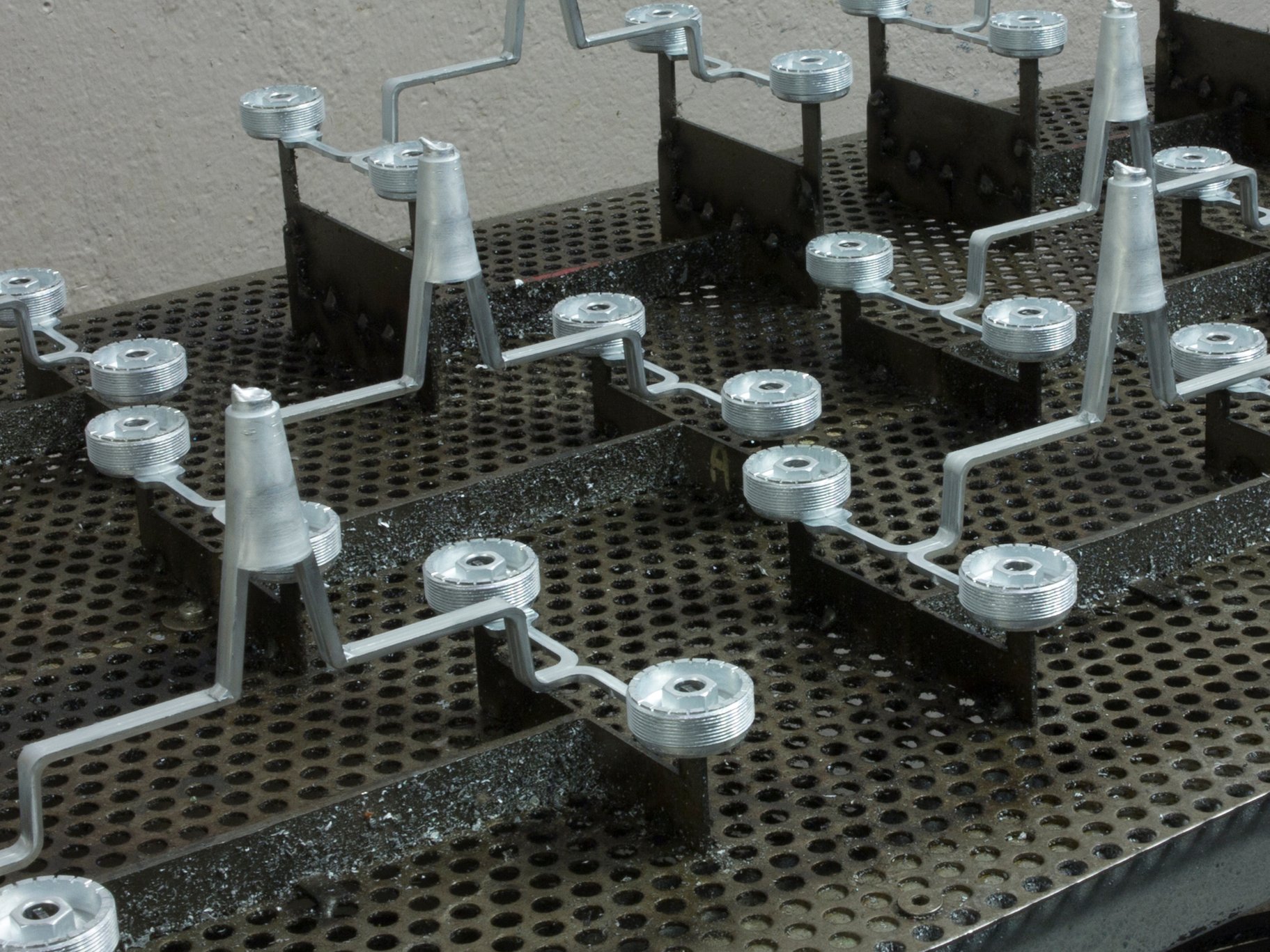 Casting process optimization: design of hot chamber injection system